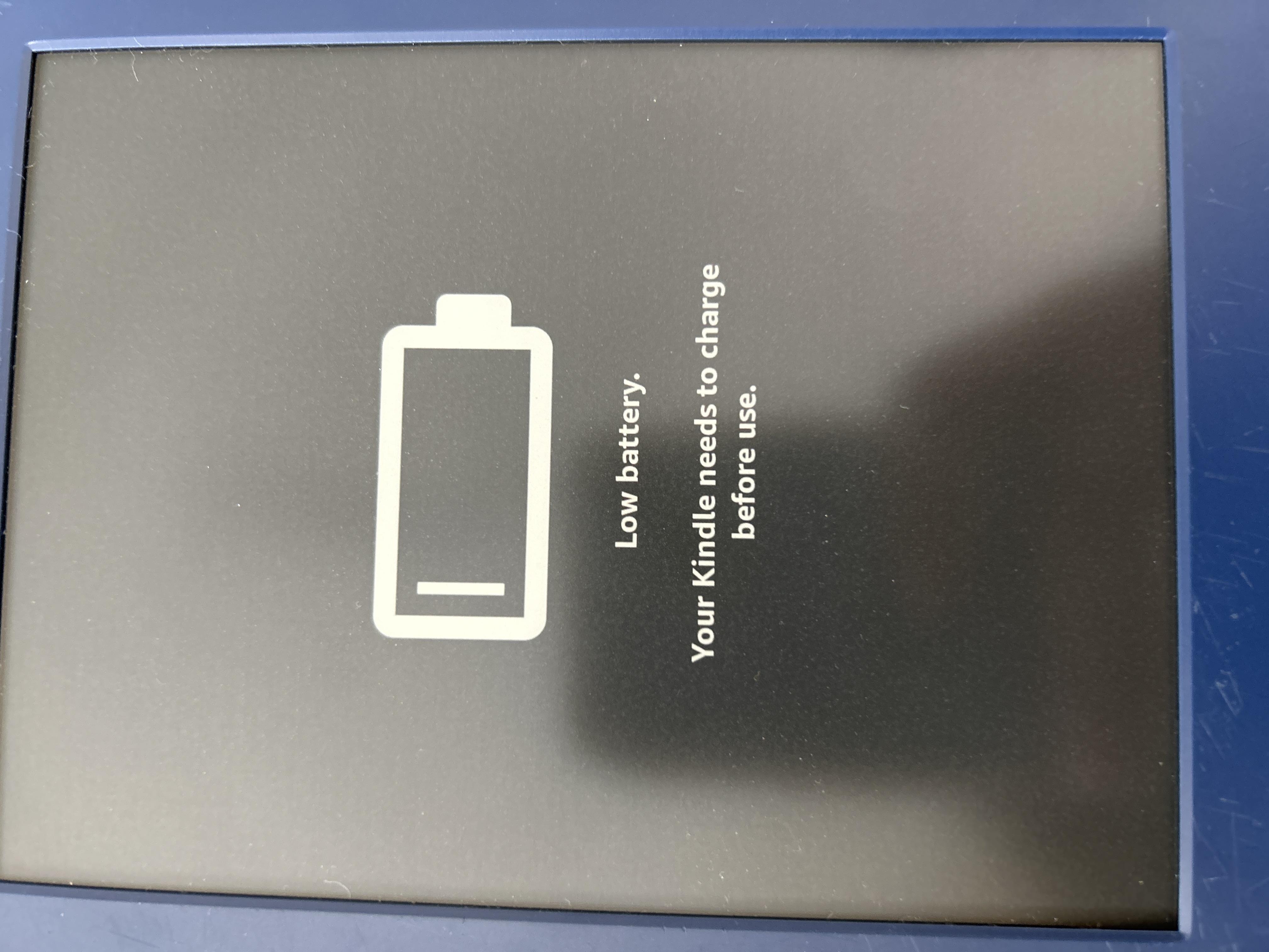Kindle screen frozen, shows low battery